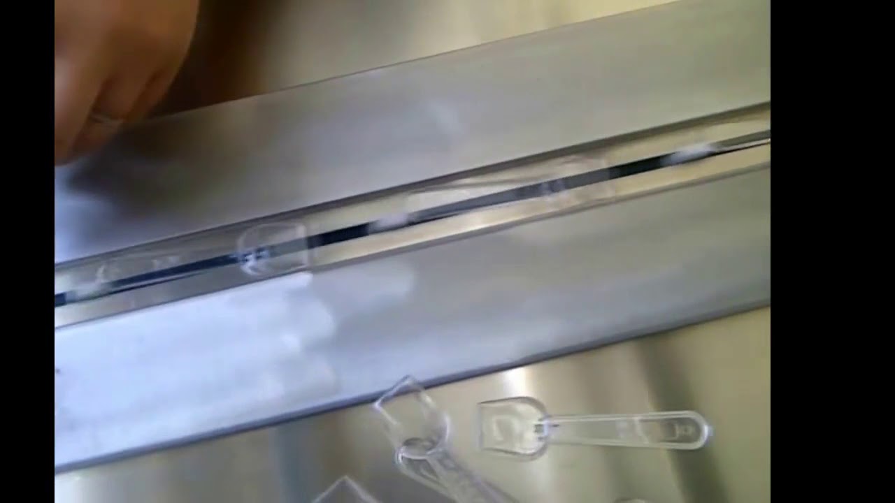 Flow wrapping and packaging plastic spoons with the SleekWrapper 40