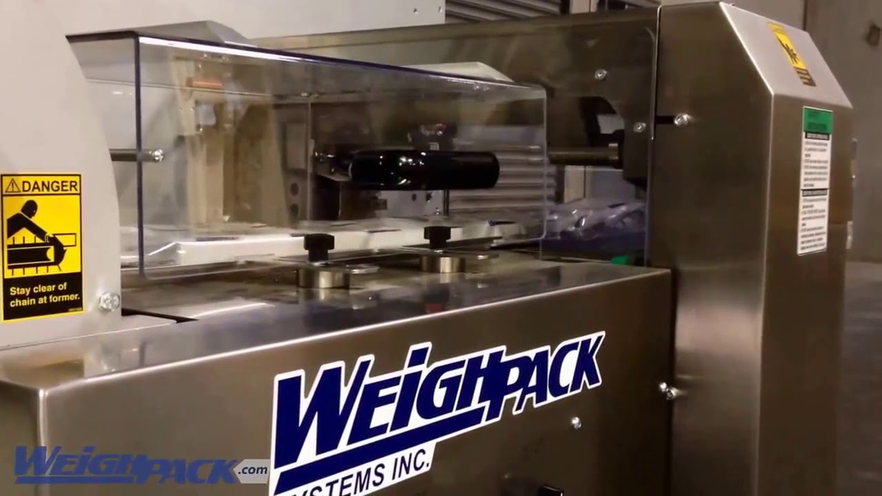 Packaging Plastic Molded Pieces - SleekWrapper 65 horizontal flow wrapper